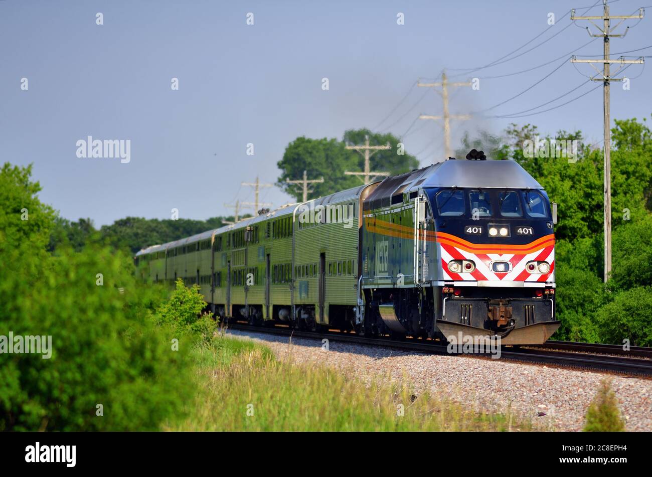 Bartlett, Illinois, USA. A Metra commuter train on a stretch of track ...