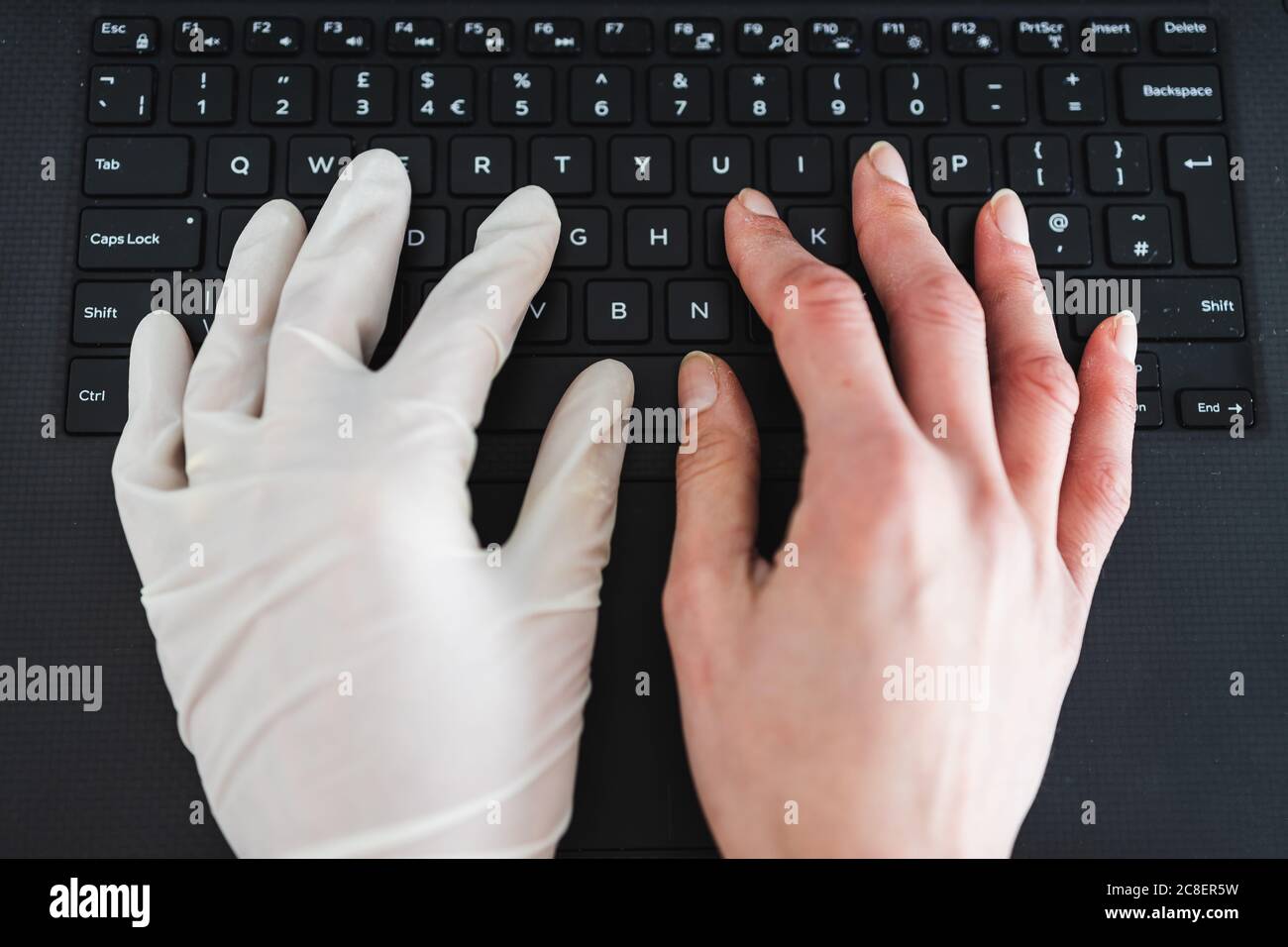 staying safe after the covid-19 virus pandemic outbreak, hand typing on ...