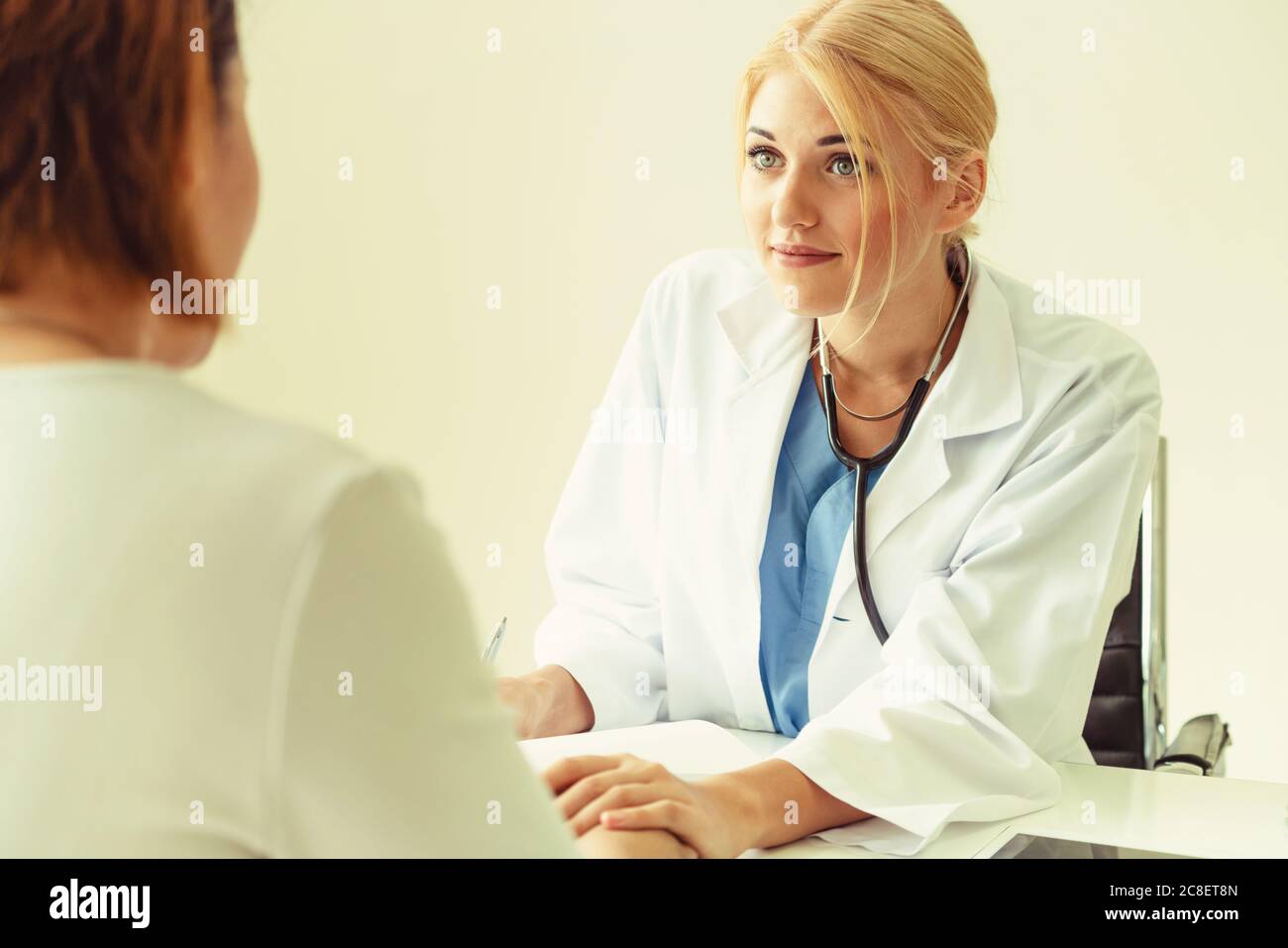 Kind doctor and patient hi-res stock photography and images - Alamy