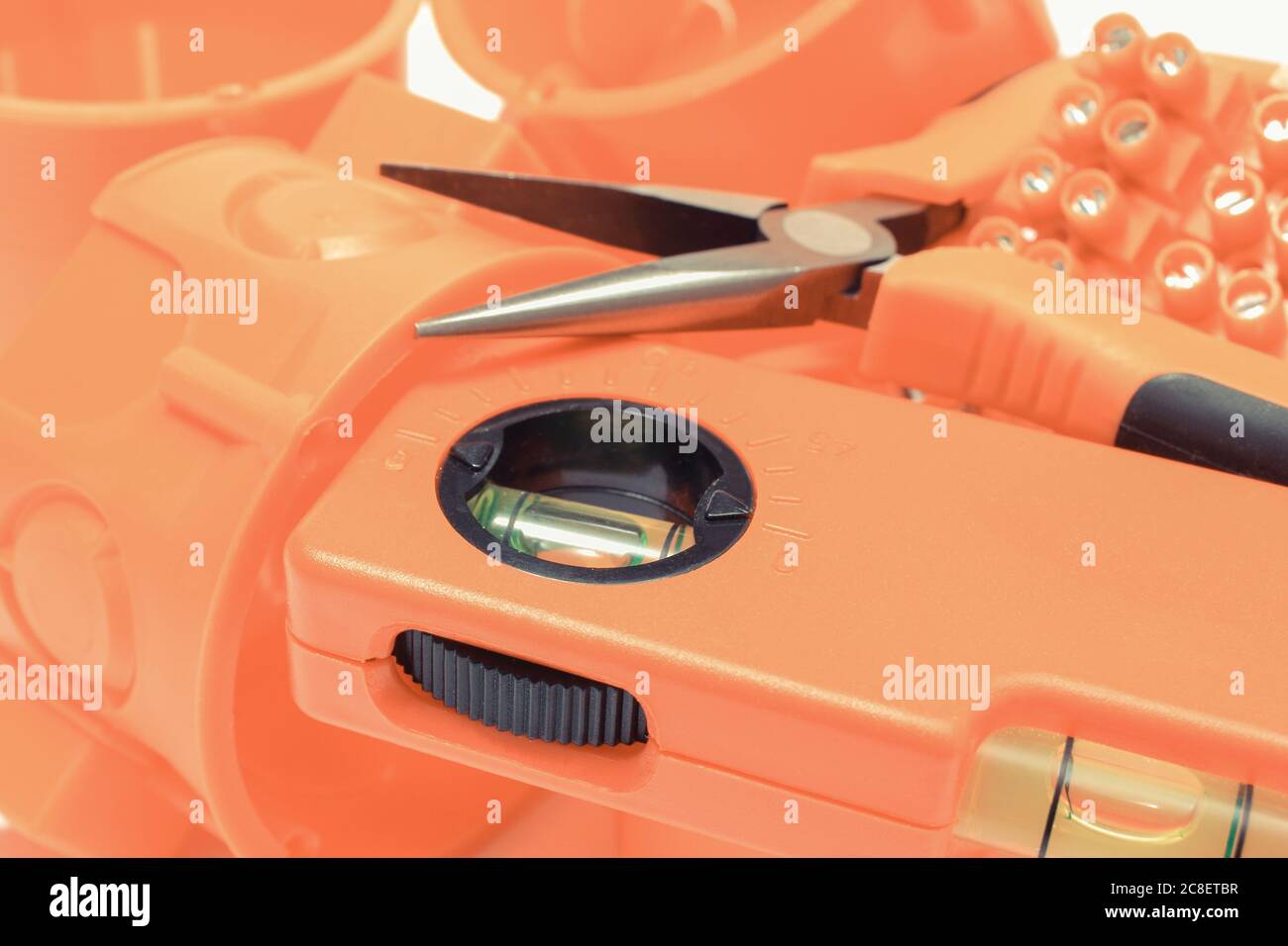 Orange electrical boxes and other components and tools using in ...