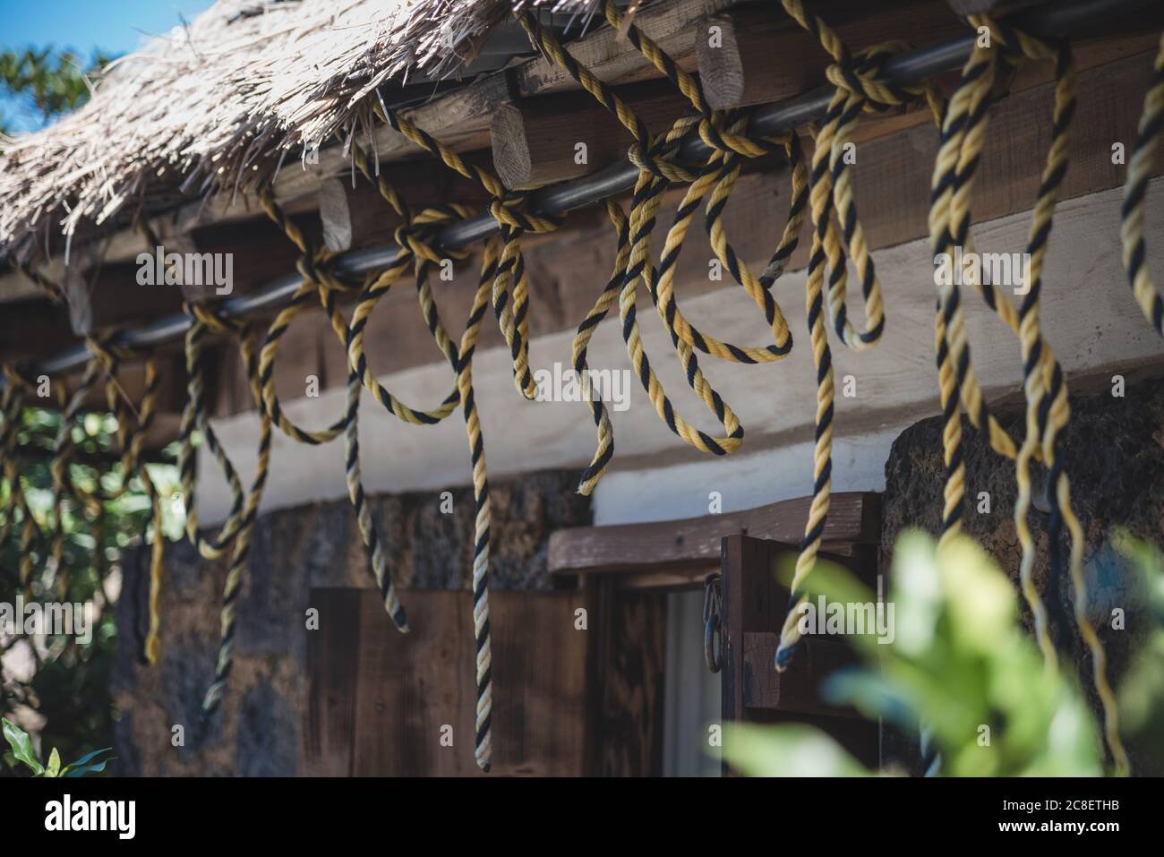 The scenery of the rope tied on the roof inside Seongeup Folk Village ...