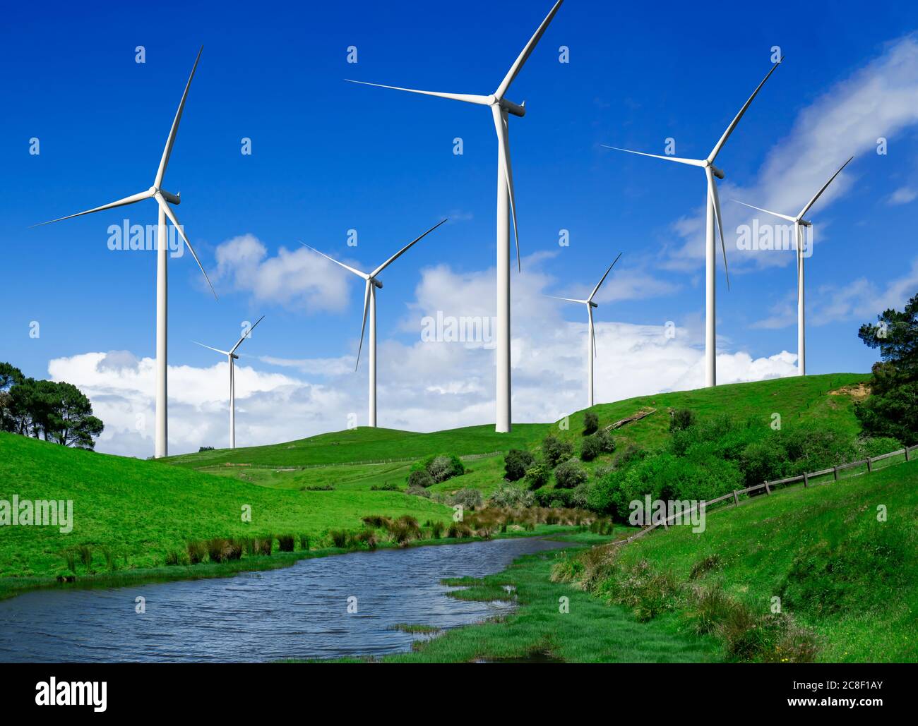Wind turbine farm in beautiful nature landscape Stock Photo - Alamy