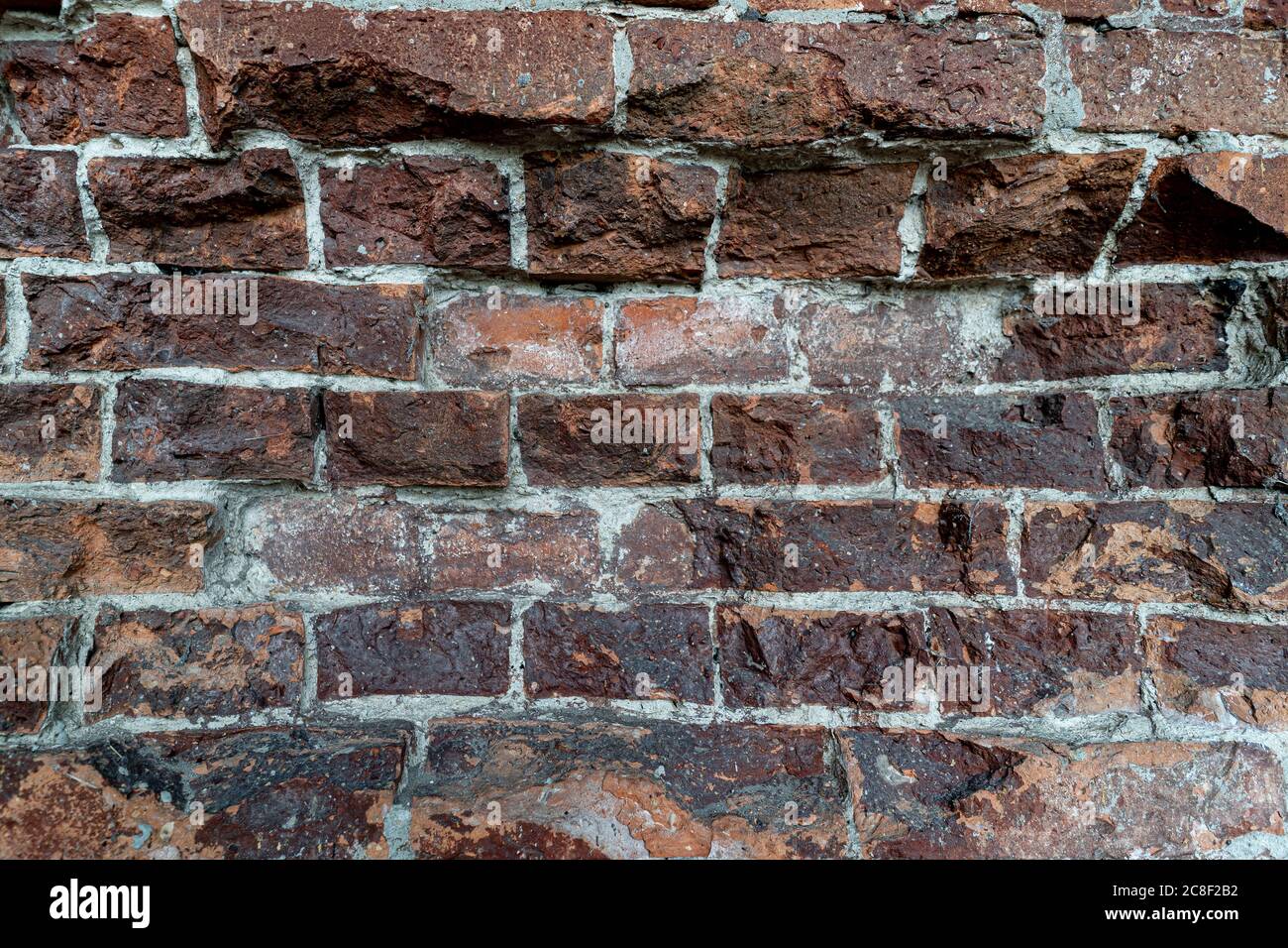 background of a concave wall of old red brick Stock Photo - Alamy