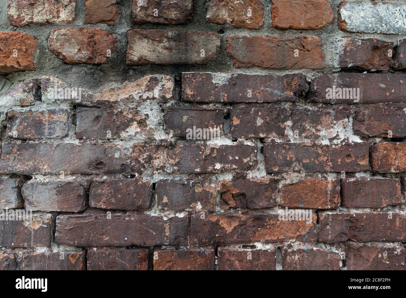 old burgundy brick wall texture Stock Photo - Alamy