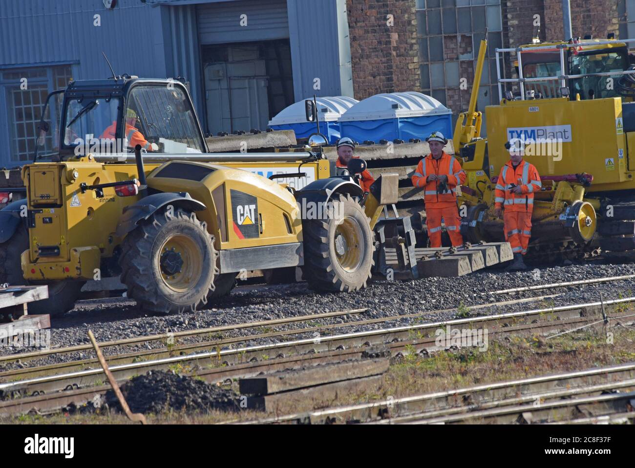 Network Rail staff working lineside on track improvements and ...