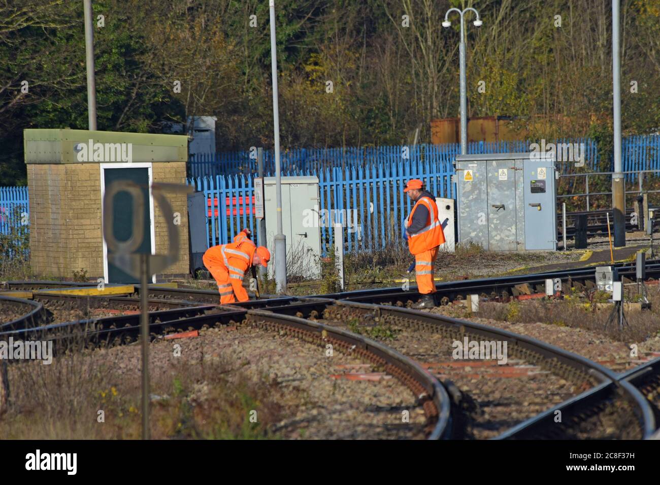 Network Rail staff working lineside on track improvements and ...