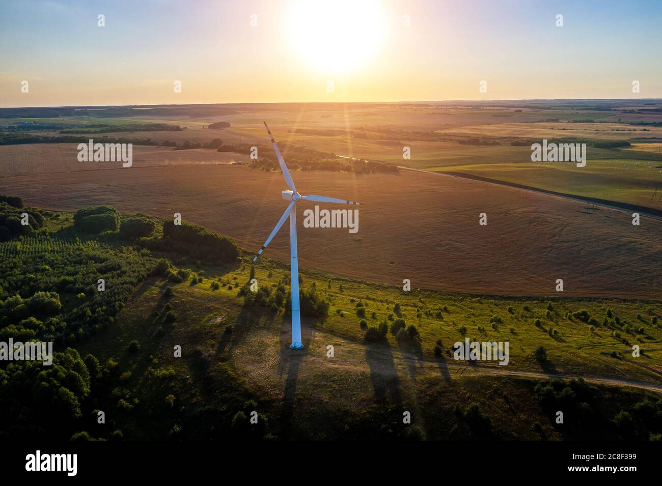 wind generator on the background of the setting sun top view from a ...