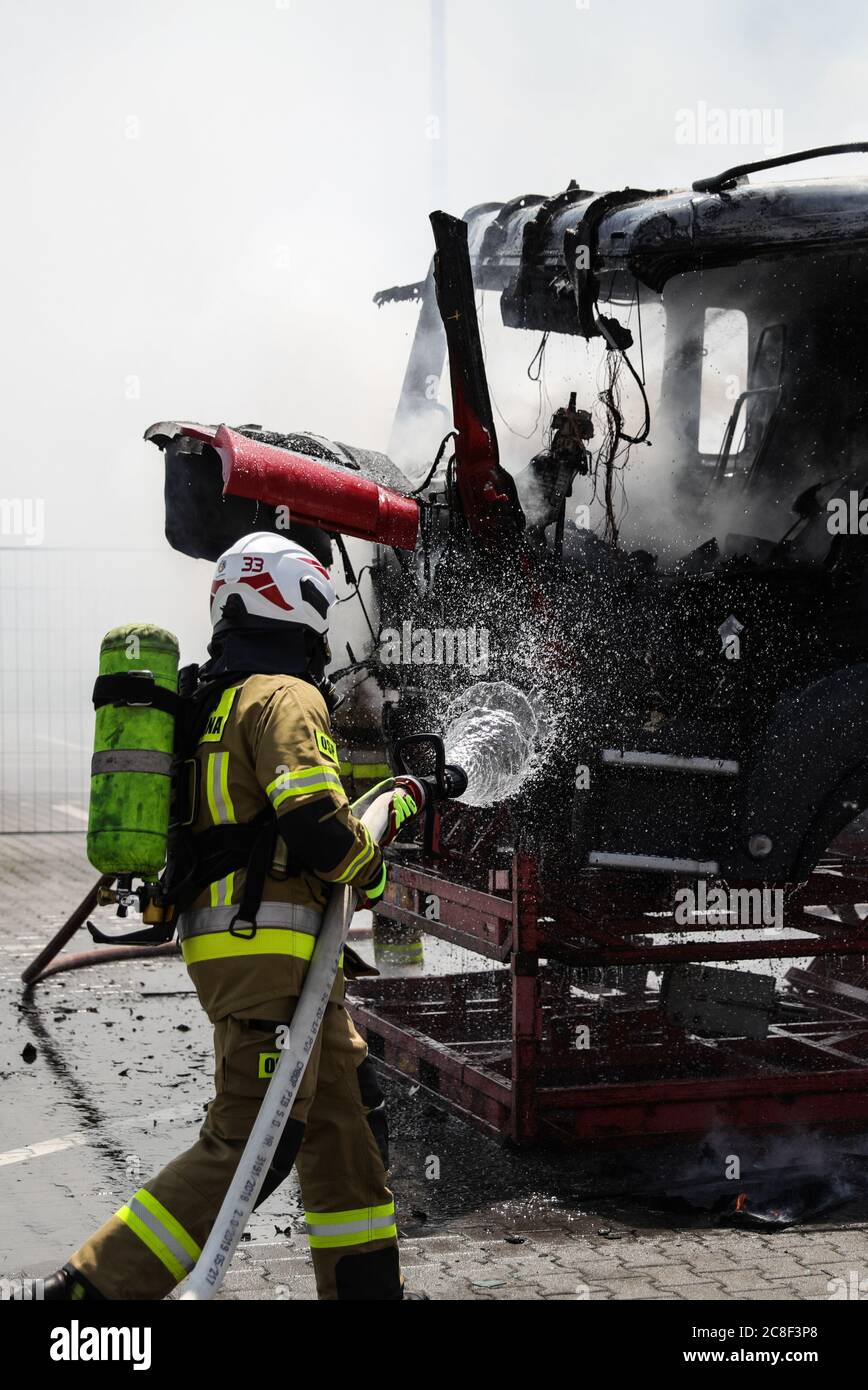a firefighter in heavy equipment seen while putting out the fire. The ...