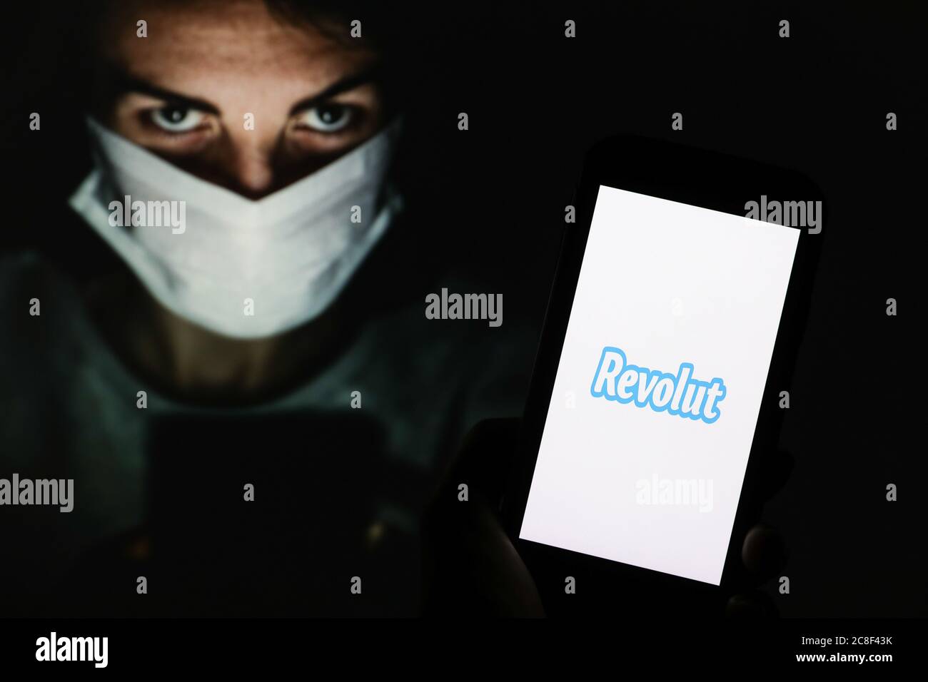 In this photo illustration a Revolut app logo seen displayed on a ...