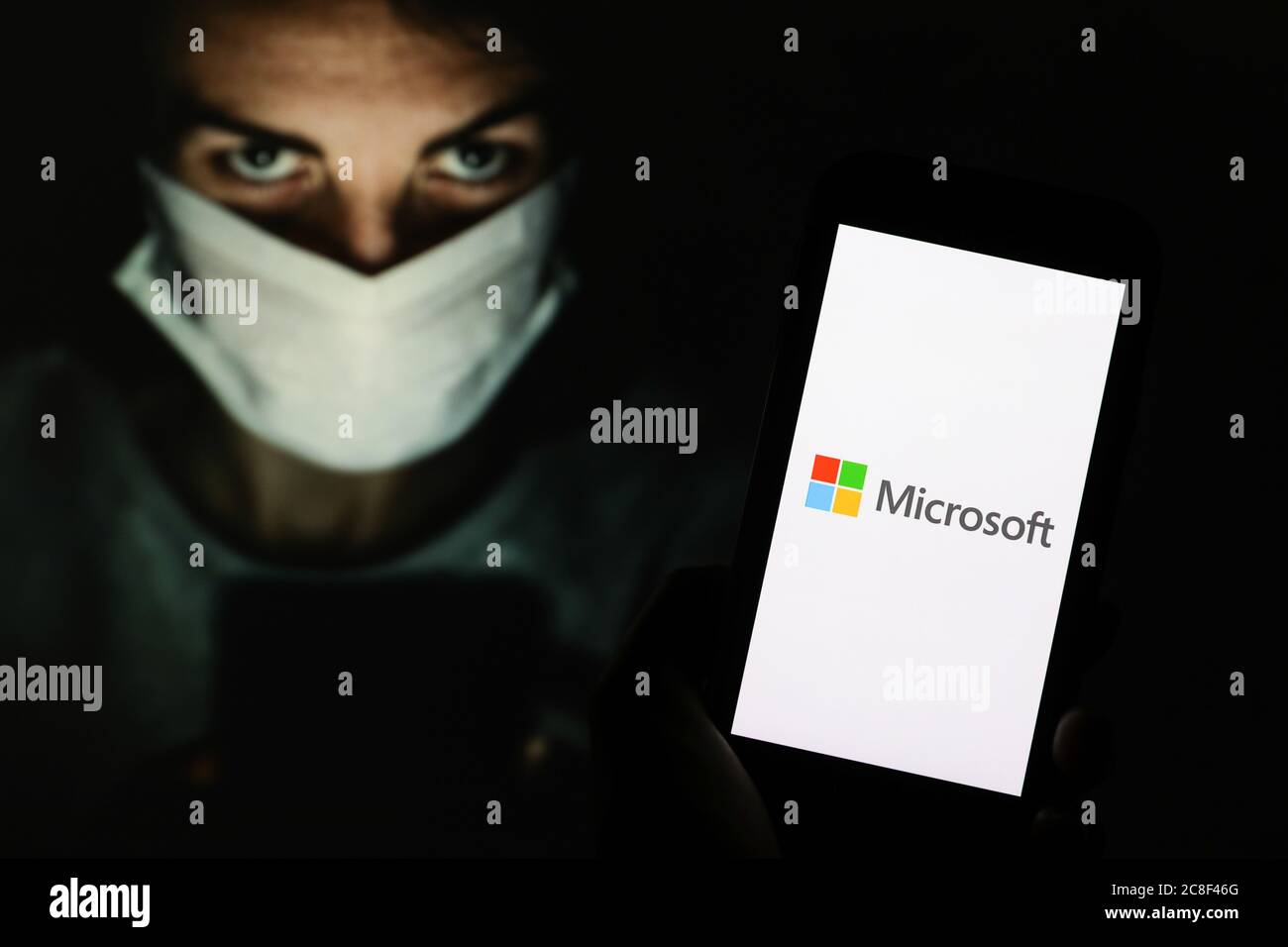 In this photo illustration a Microsoft logo seen displayed on a ...
