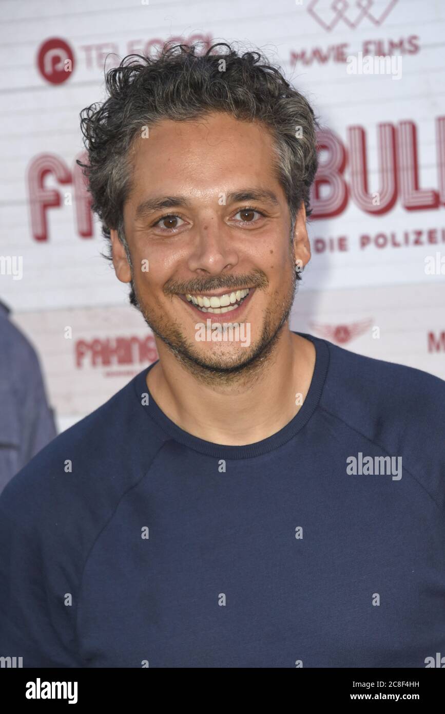 Munich, Germany. 23rd July, 2020. Actor Erkan Acar smiles before the film premiere of "Faking ...