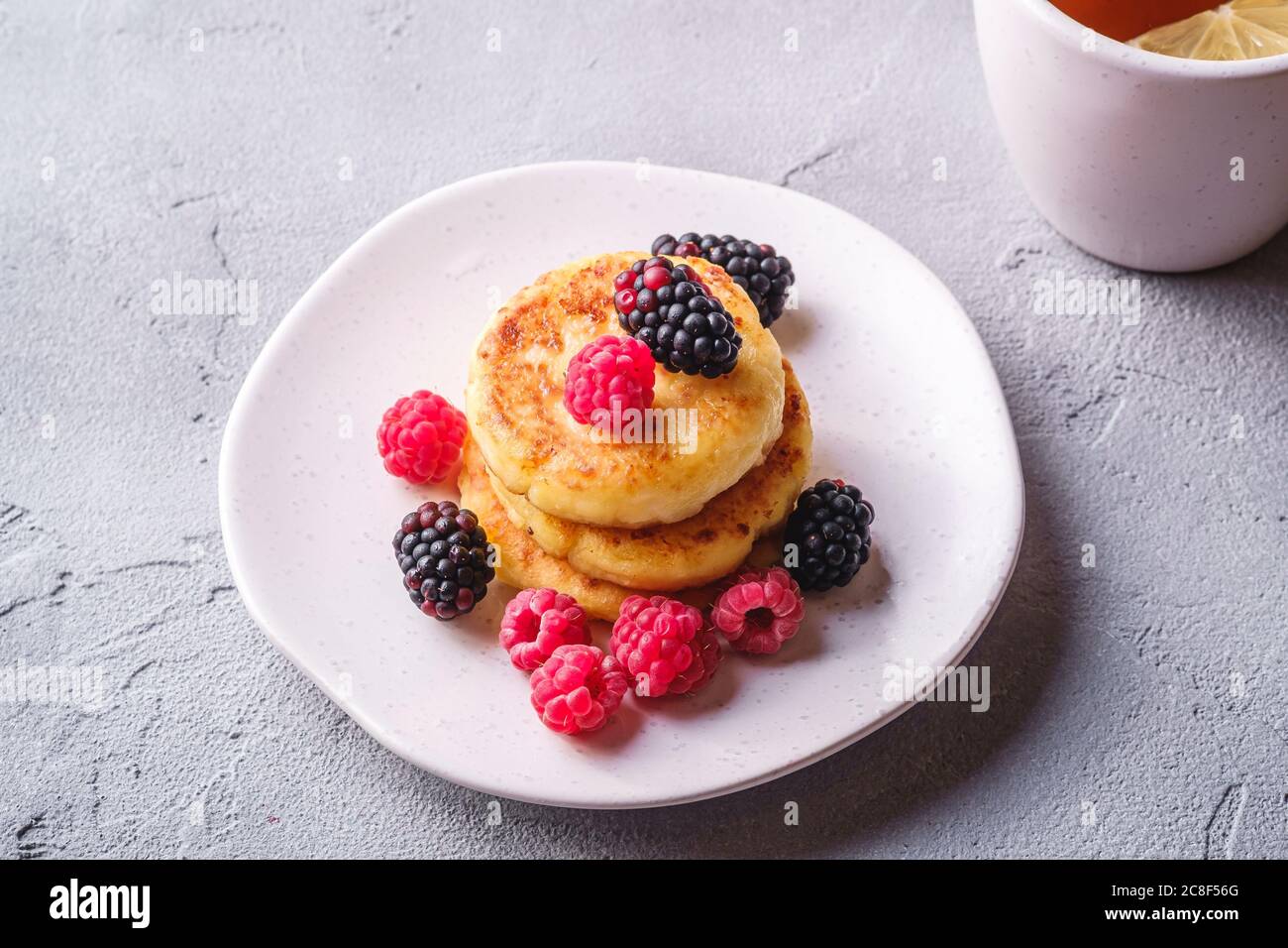 Lemon curd in cup hi-res stock photography and images - Alamy