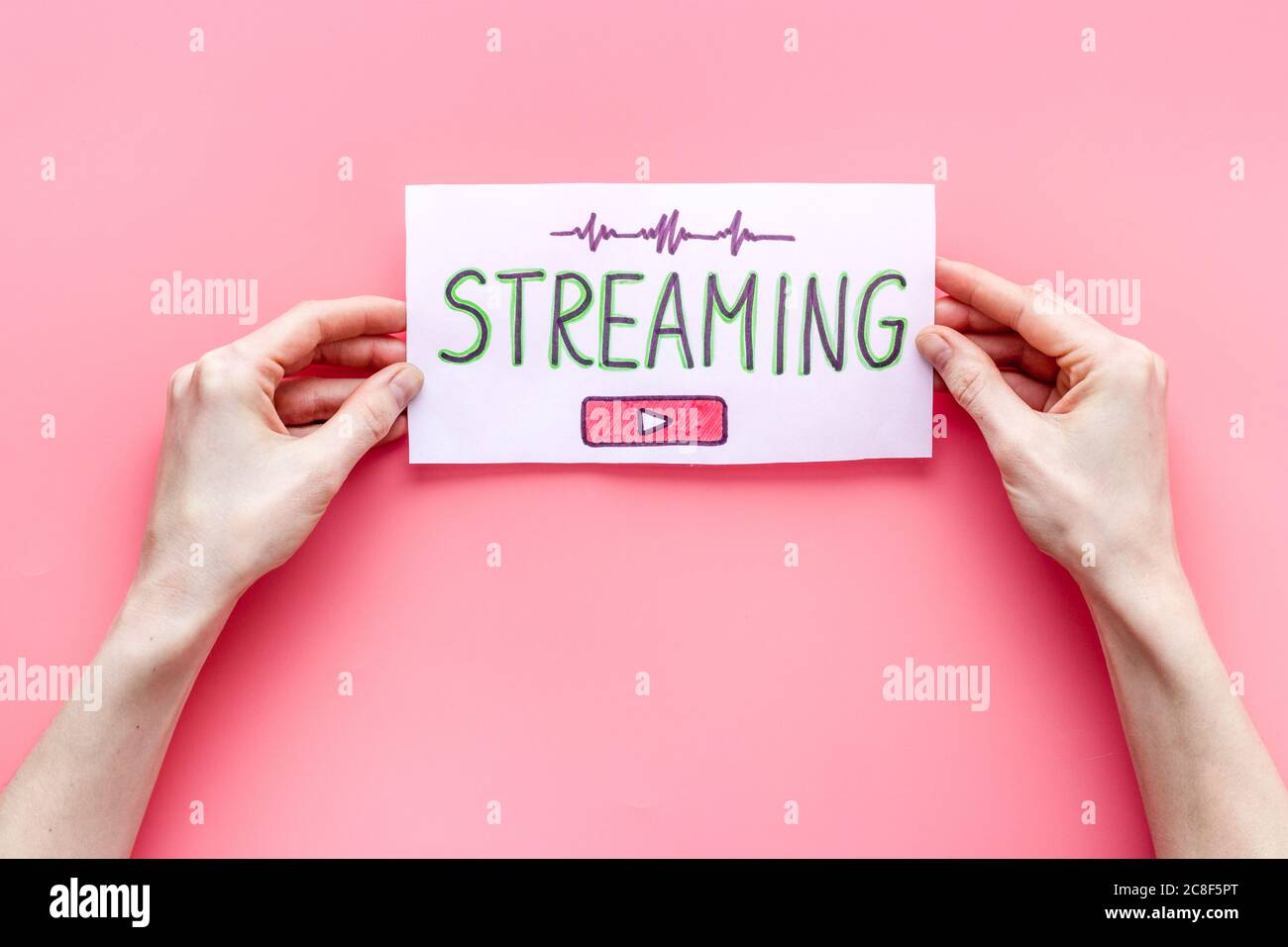Live streaming web network concept. Female hands holding paper tablet ...