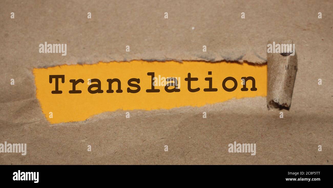 Translation word written under torn paper. Multicultural business ...