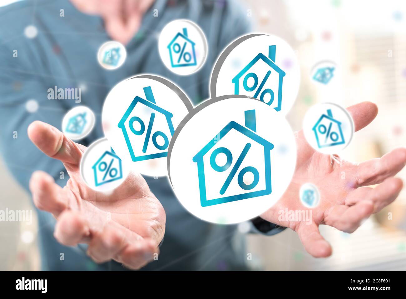 Interest rates concept above the hands of a man in background Stock ...