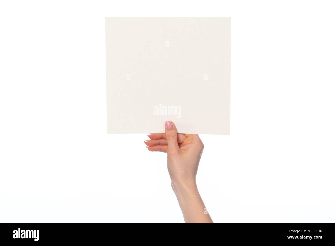 Woman's hand showing white paper banner isolated on white Stock Photo ...