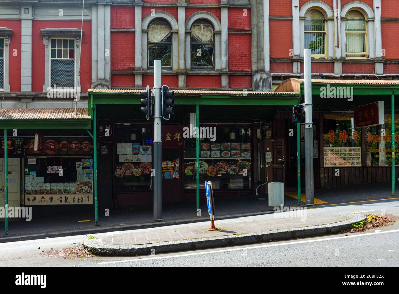 row of red brick shops on Queen Street, Auckland Stock Photo - Alamy
