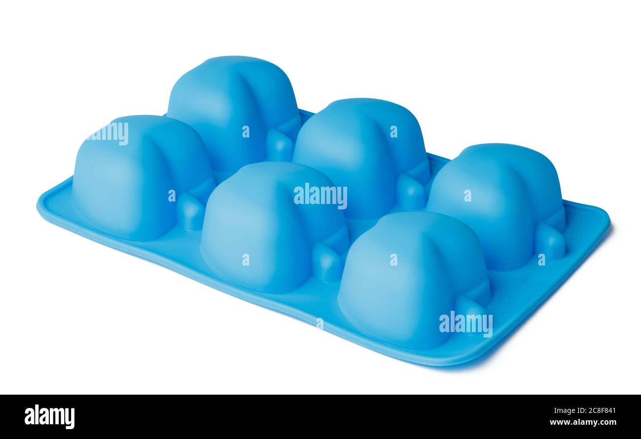 Silicone form for cupcake baking on white background Stock Photo - Alamy