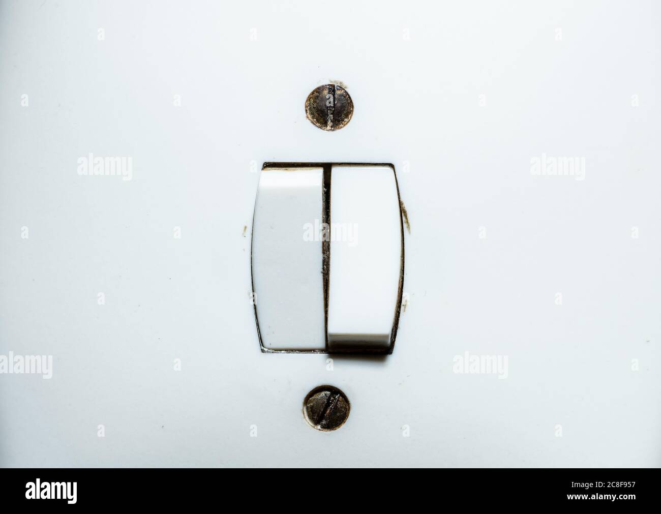 Vintage white plastic double light switch Stock Photo - Alamy