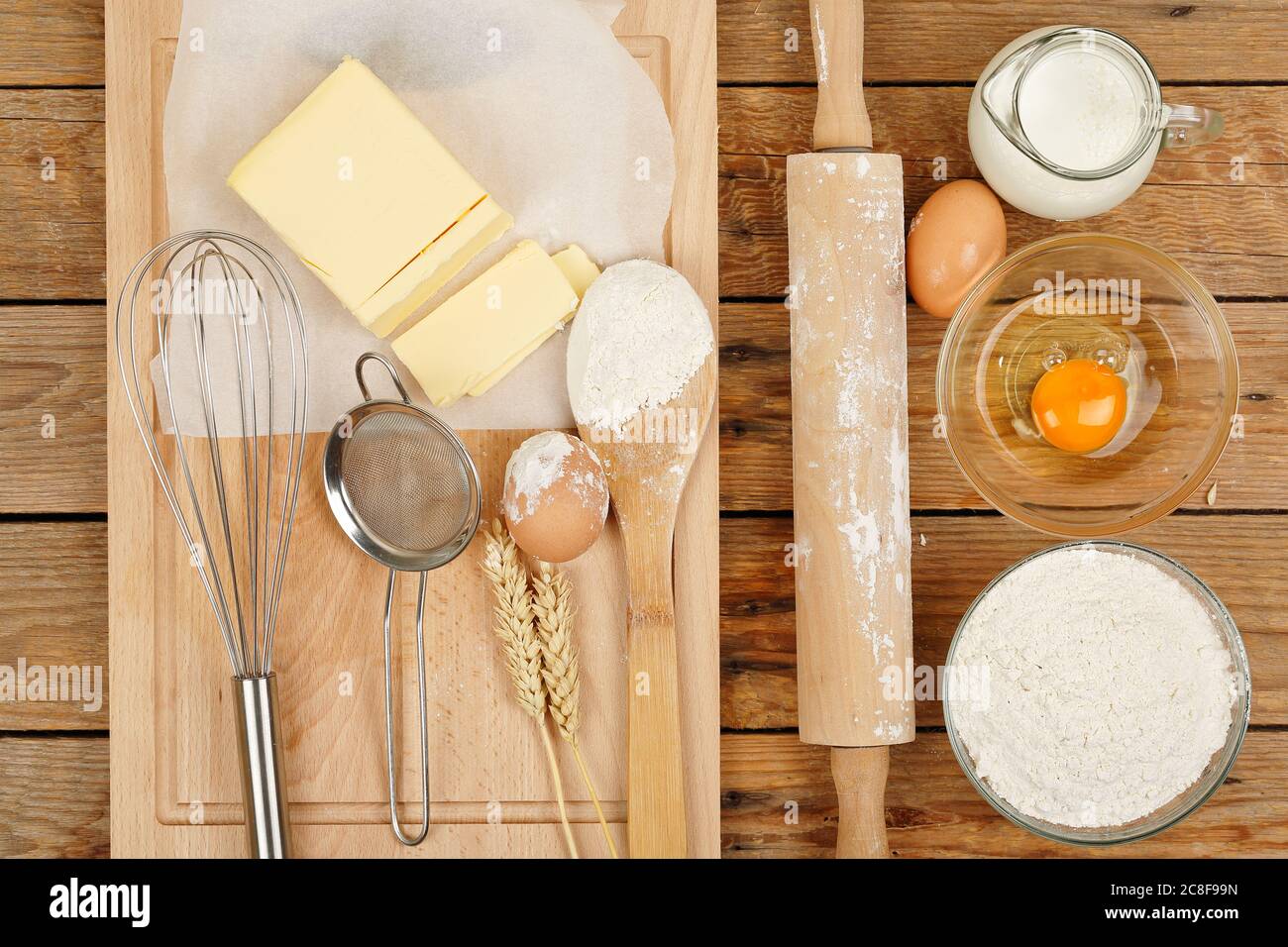 baking preparation, top view of a variety of objects on wooden planks ...