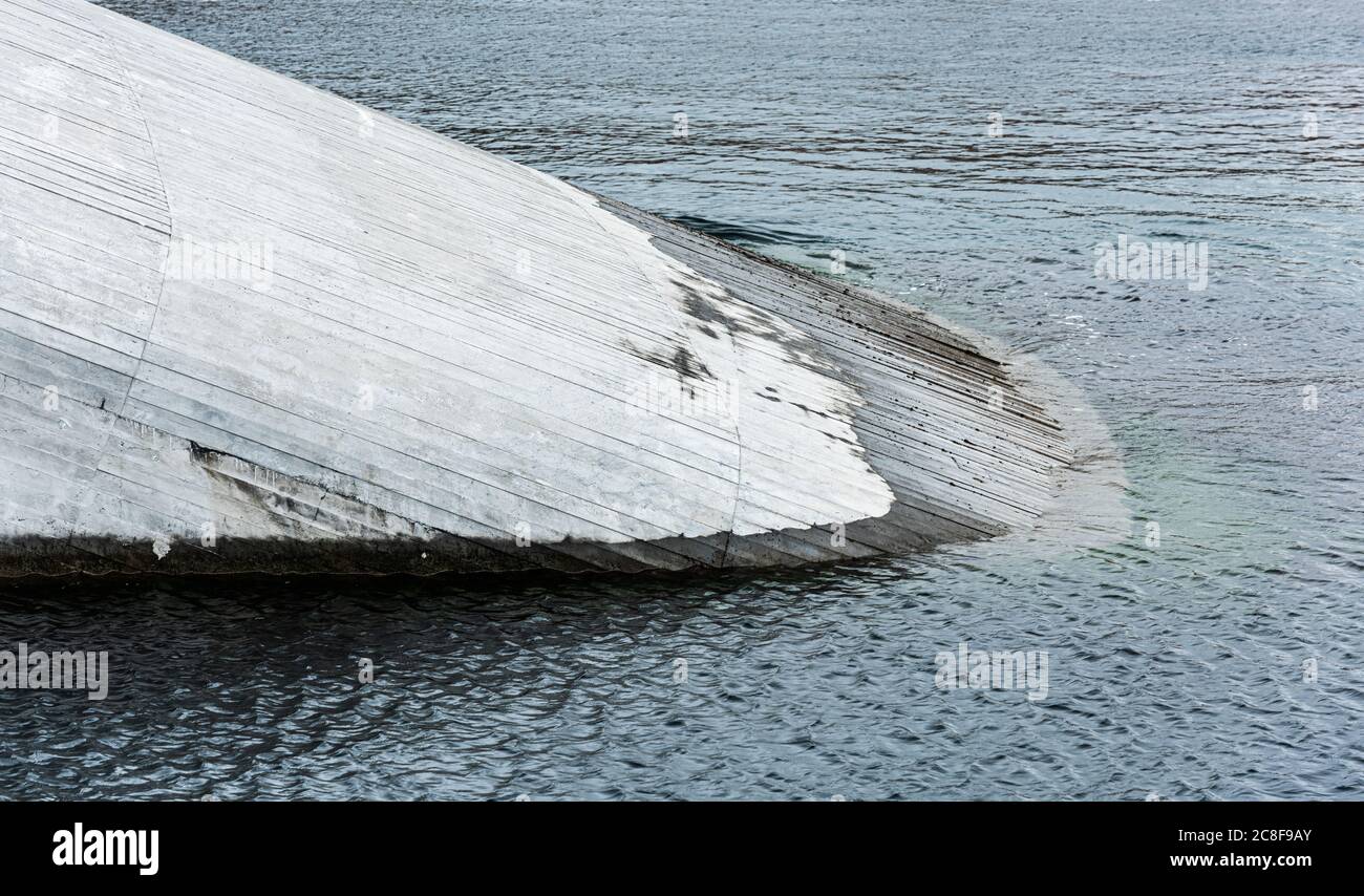 Concrete structure going into the water at a sloping angle Stock Photo ...