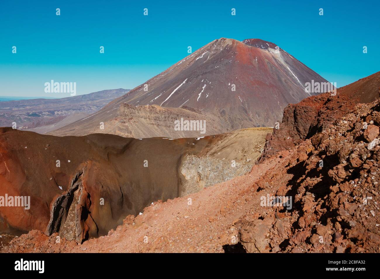 Red and brown slopes of Mt. Ngāuruhoe, an active volcano on the ...