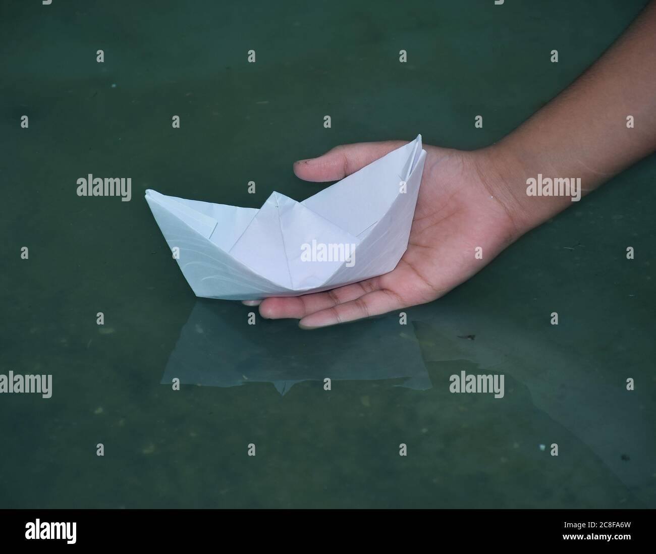 Child Launching Boat High Resolution Stock Photography and Images - Alamy