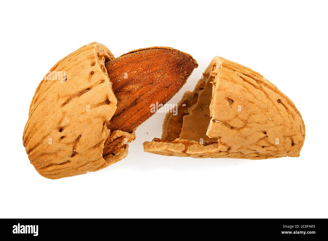 macro of broken almond isolated on white Stock Photo - Alamy