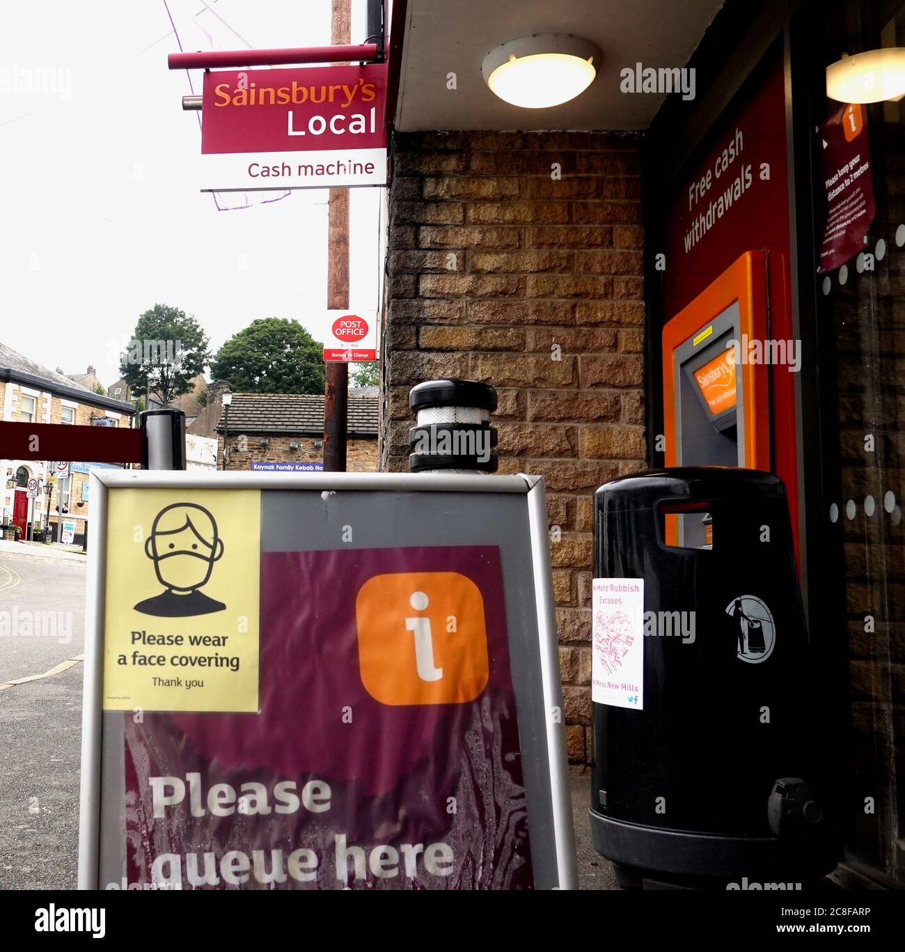 A notice outside Sainsbury's Local, New Mills, Derbyshire requesting ...