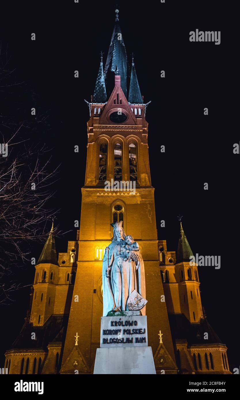 Statue of Our Lady in front of Saint Catherine garrison church in Torun ...