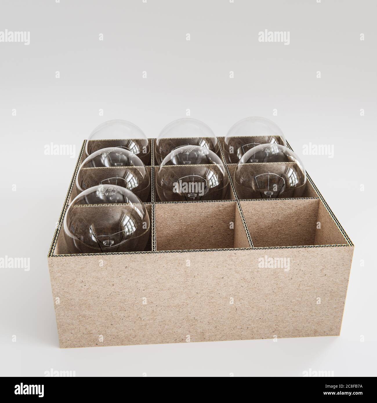 light bulbs in a box isolated on white background 3d illustration Stock ...