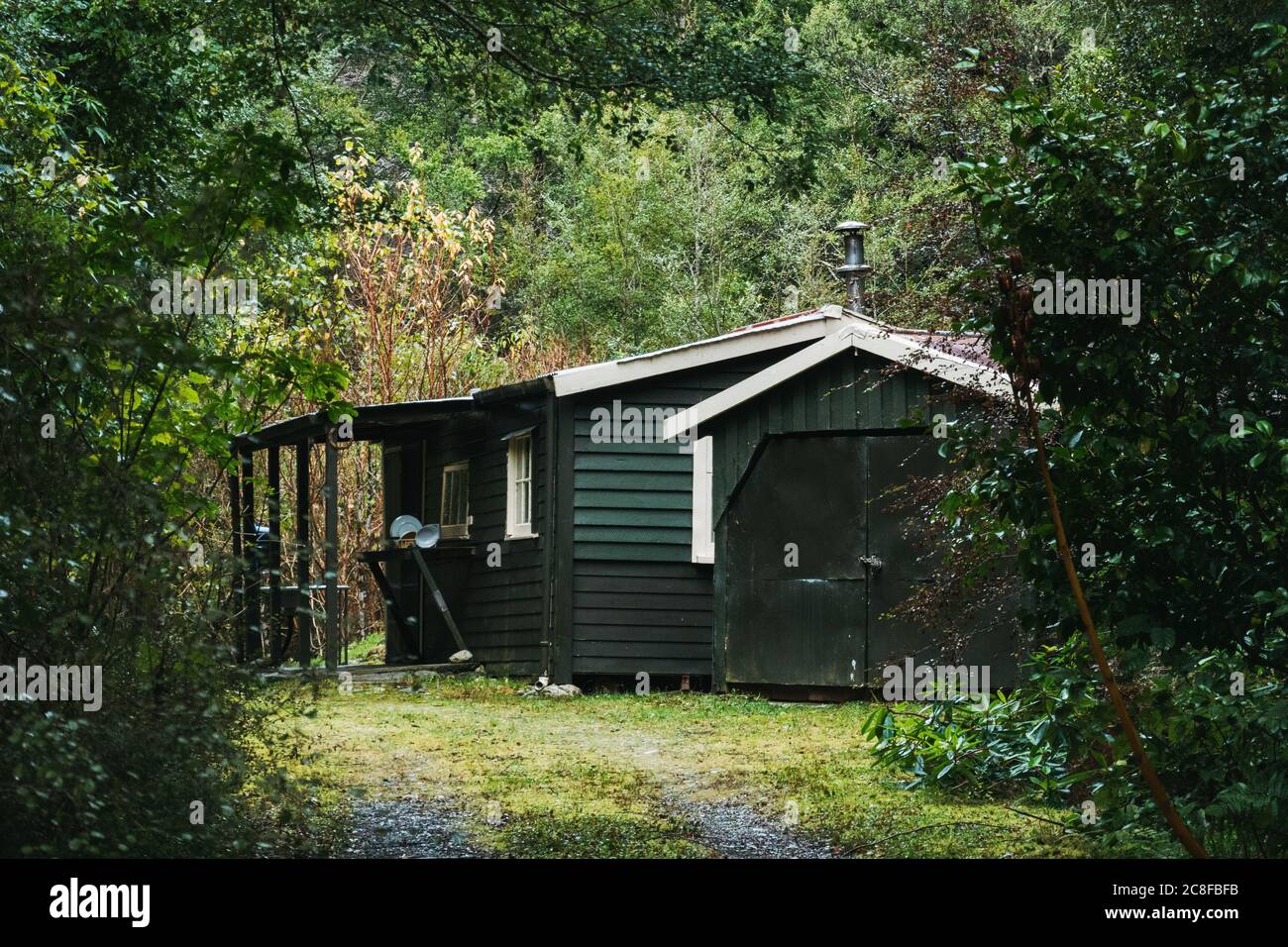 A secluded bush hut in the West Coast of the South Island, New Zealand ...