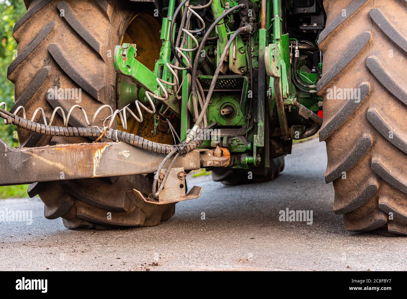 Coupling of a green tractor Stock Photo - Alamy