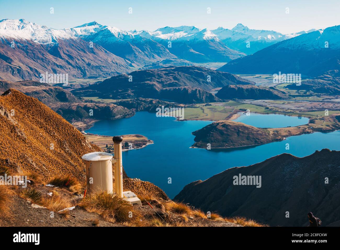 A small cylindrical toilet on the Roys Peak Track, near the viewpoint ...