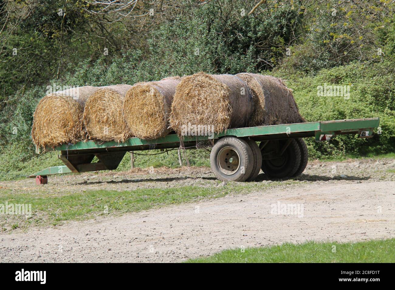 An Agricultural Farm Flat Bed Trailer with Hay Bales Stock Photo - Alamy