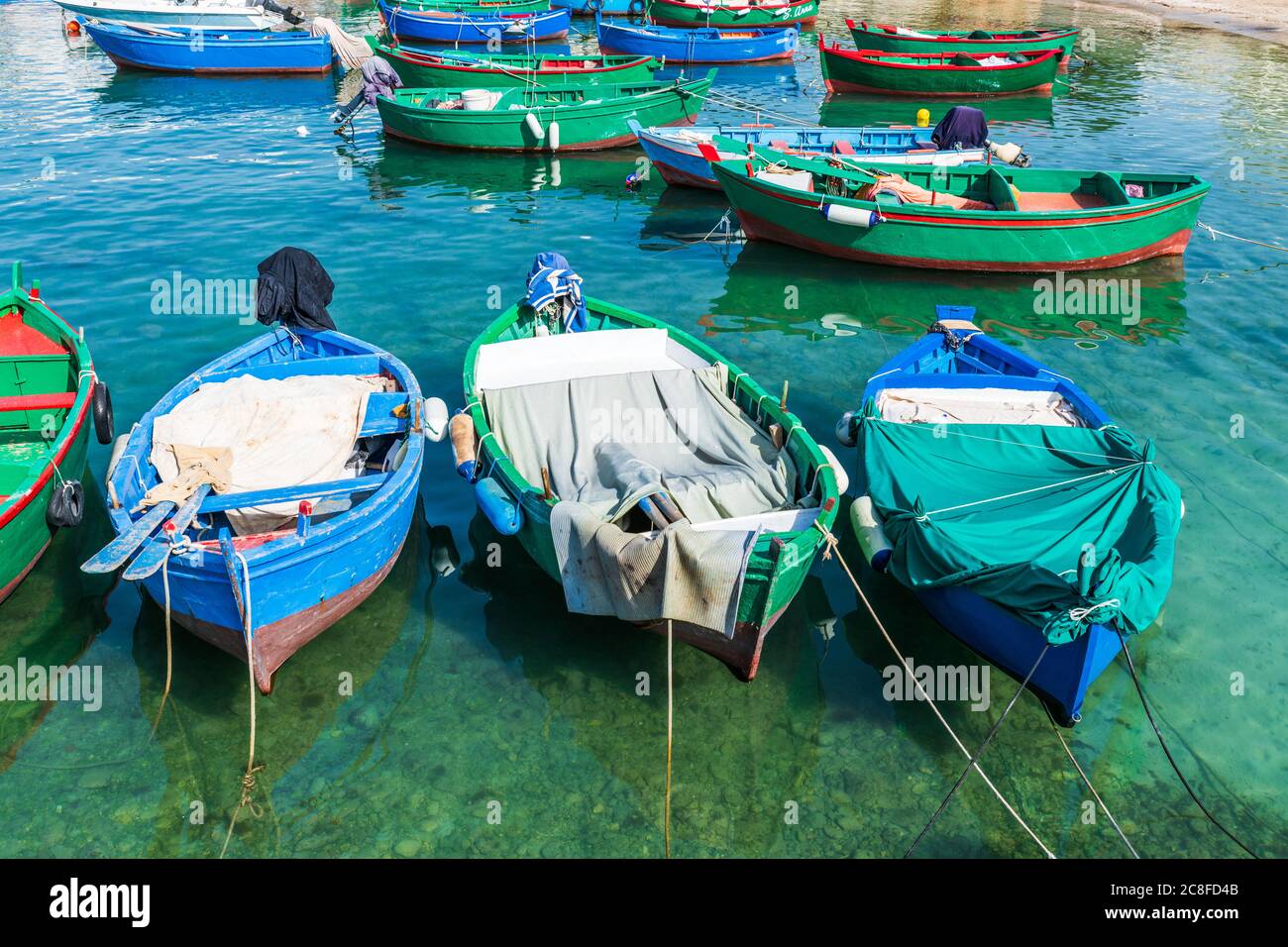 Monastery and boats frame the bay of San Vito Stock Photo - Alamy