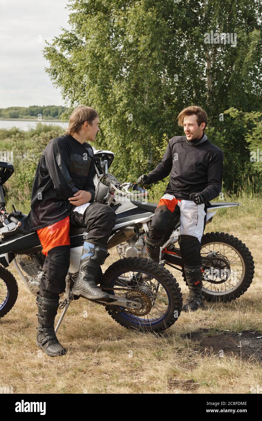 Talking to motorcyclist hi-res stock photography and images - Alamy