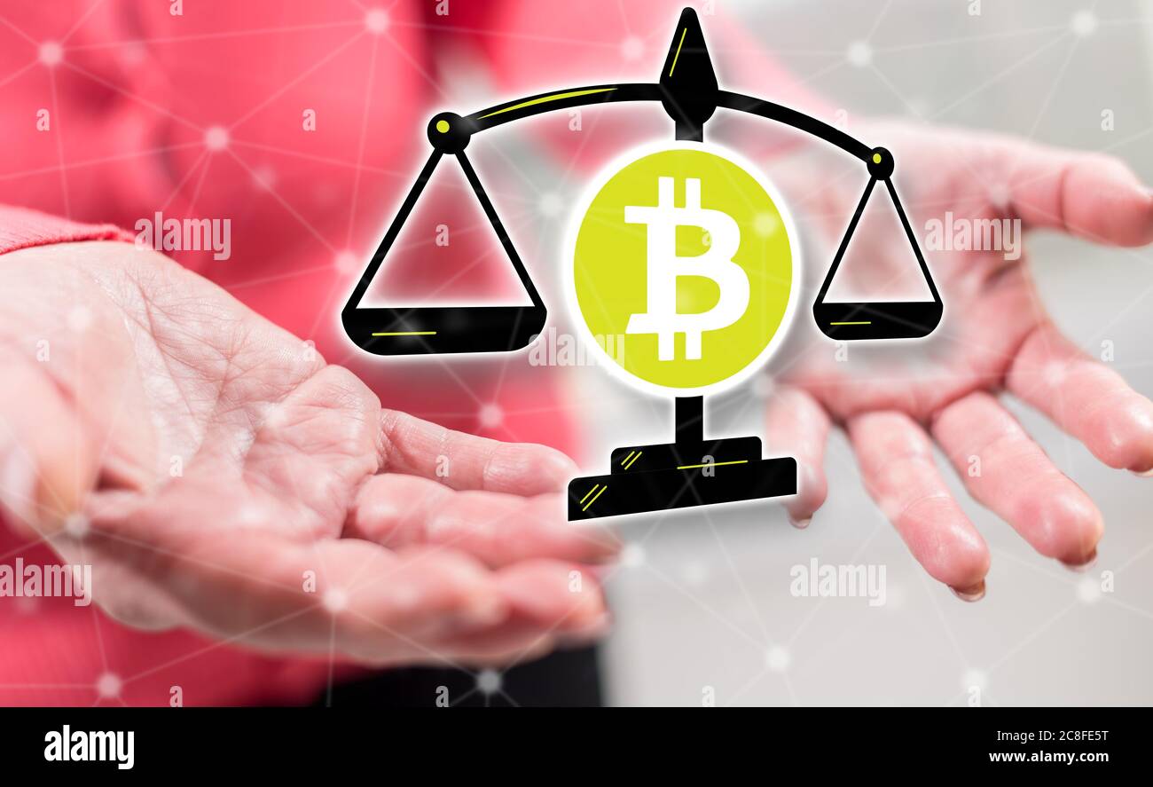 Bitcoin regulation concept above the hands of a woman in background ...