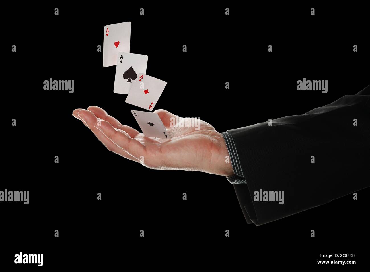 Playing cards falling on black hi-res stock photography and images - Alamy