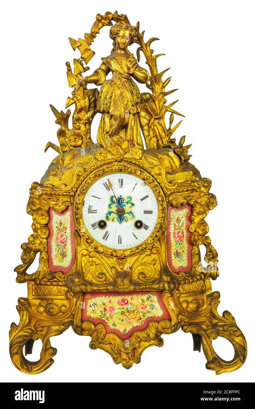 Genuine eighteenth century golden table clock isolated on a white ...
