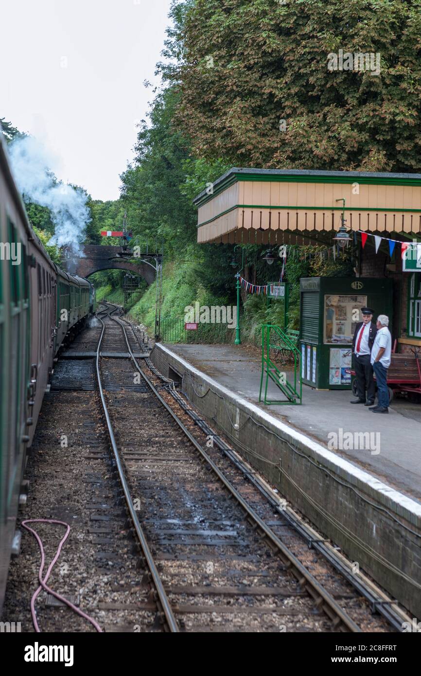 A steam train leaving Alresford Station on the Mid-Hants Steam Railway ...