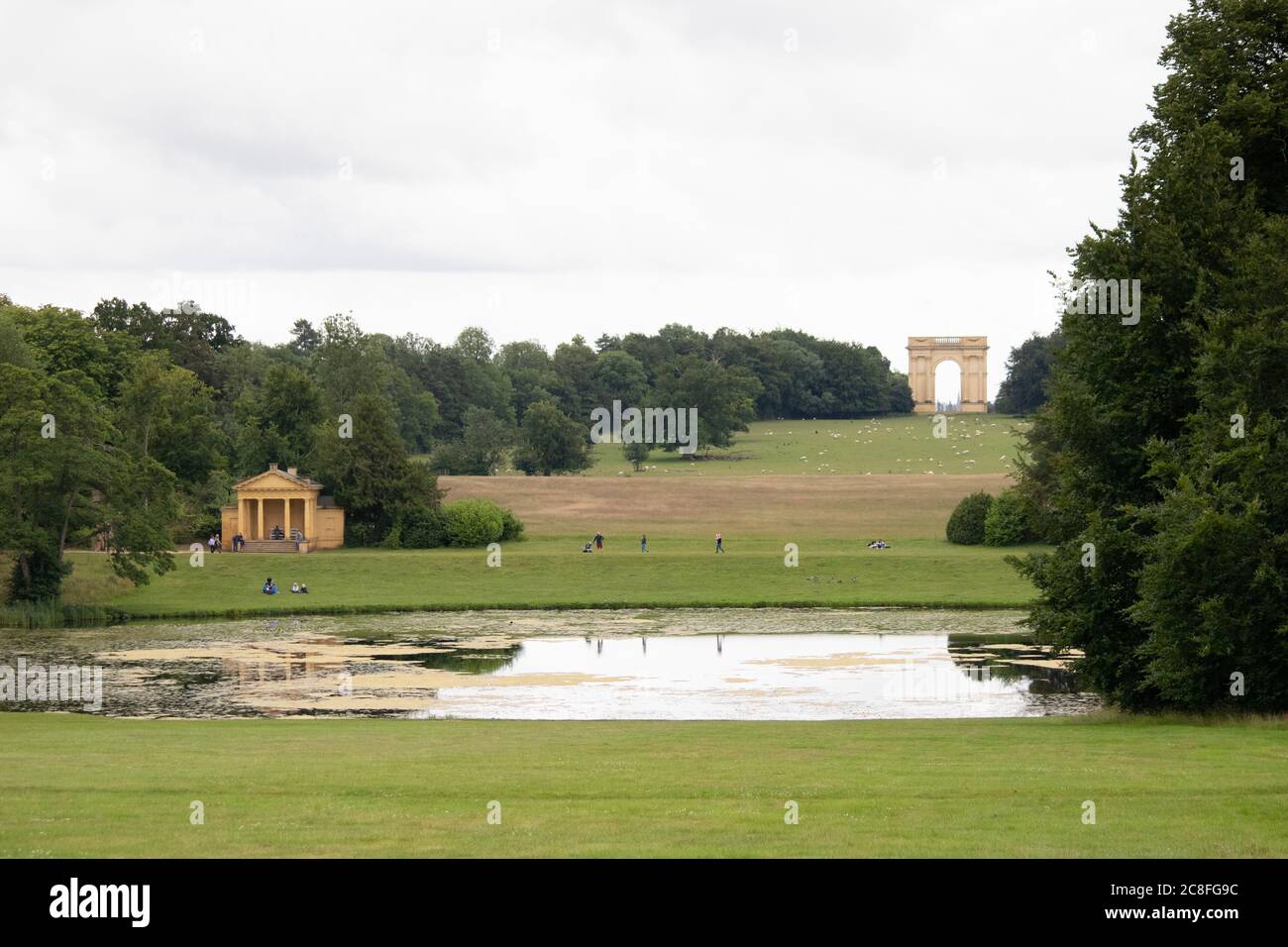The view to Bell Gate taken across the Stowe gardens and lake from ...