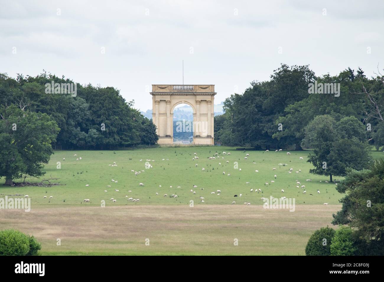 The view to Bell Gate taken across the Stowe gardens and lake from ...