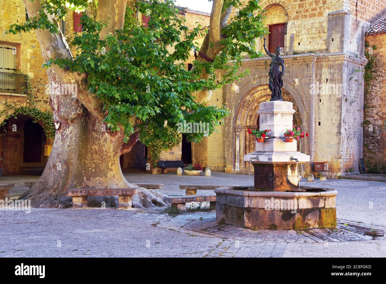 Saint Guilhem le Desert, the main place of the village, Unesco world ...