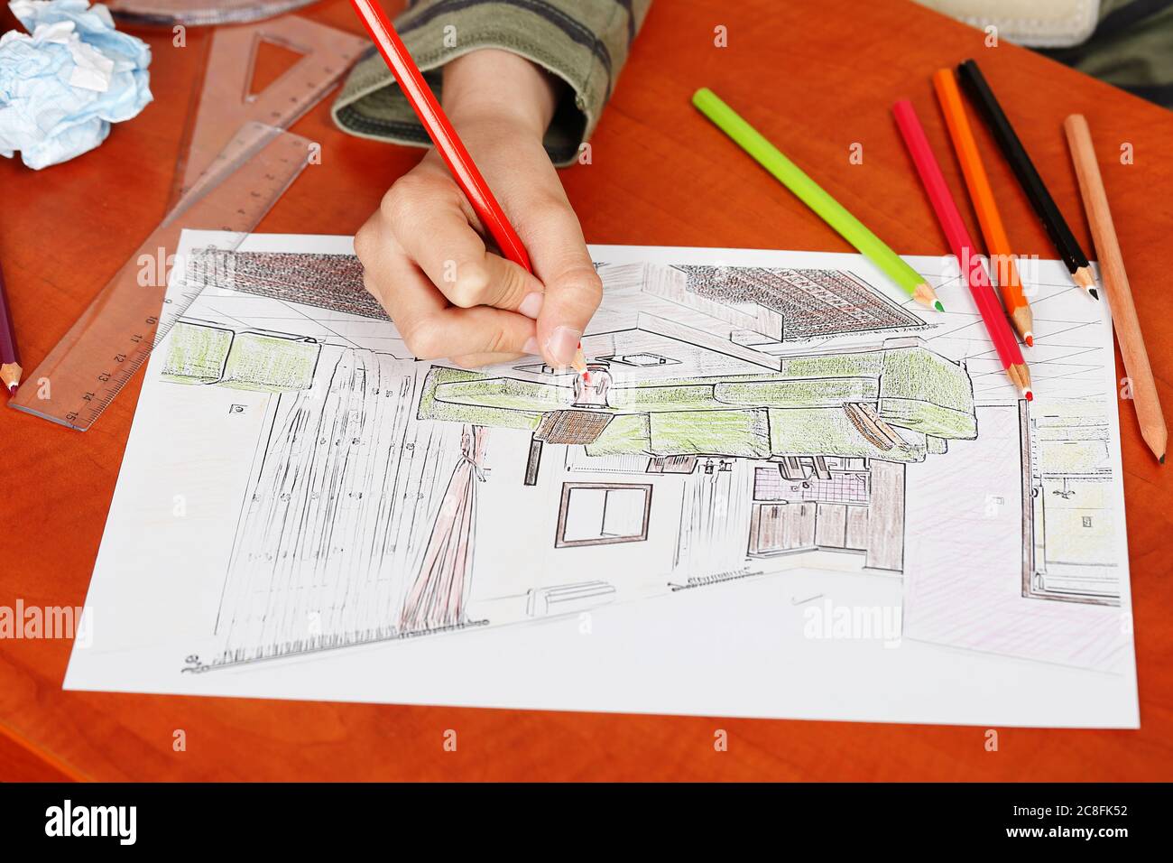 closeup of a boy's hand drawing a house interior Stock Photo - Alamy