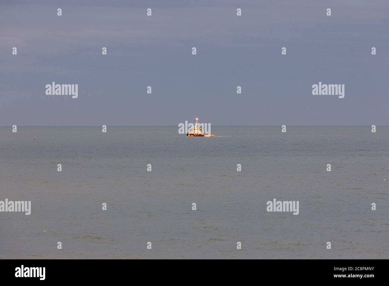 A yellow barge in the English Channel Stock Photo - Alamy