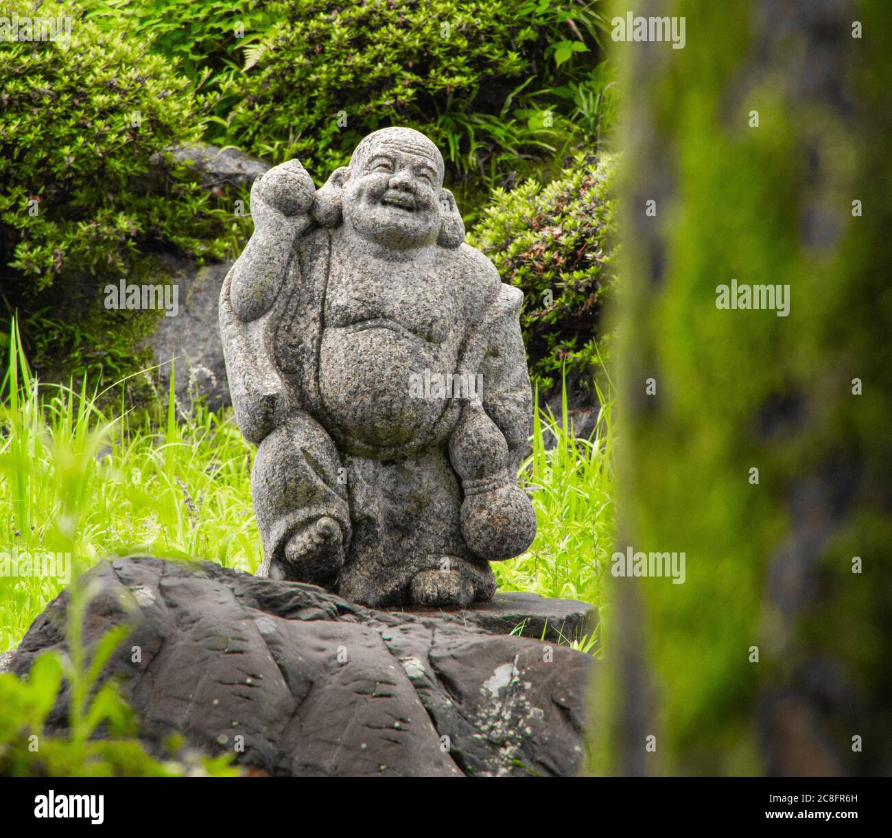 Statue of Budai, a semi-historical Chinese monk from the 10th century ...