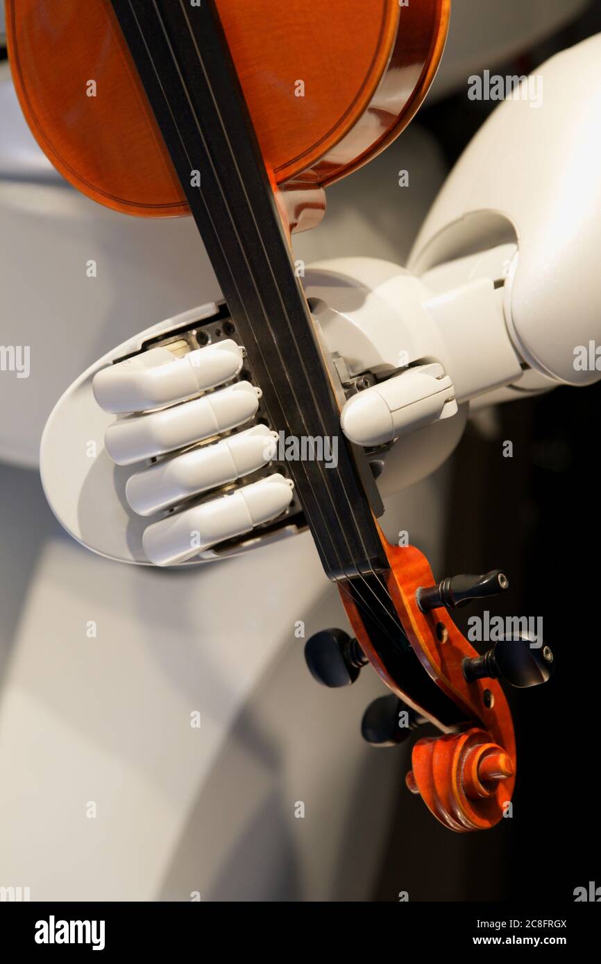 A robot plays the violin Stock Photo - Alamy
