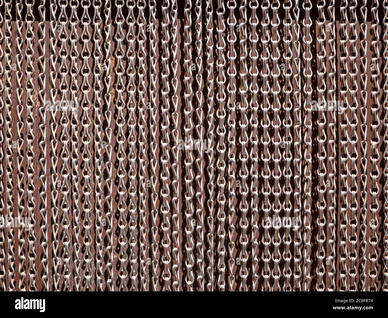 Metallic chains curtains on the door background texture Stock Photo - Alamy