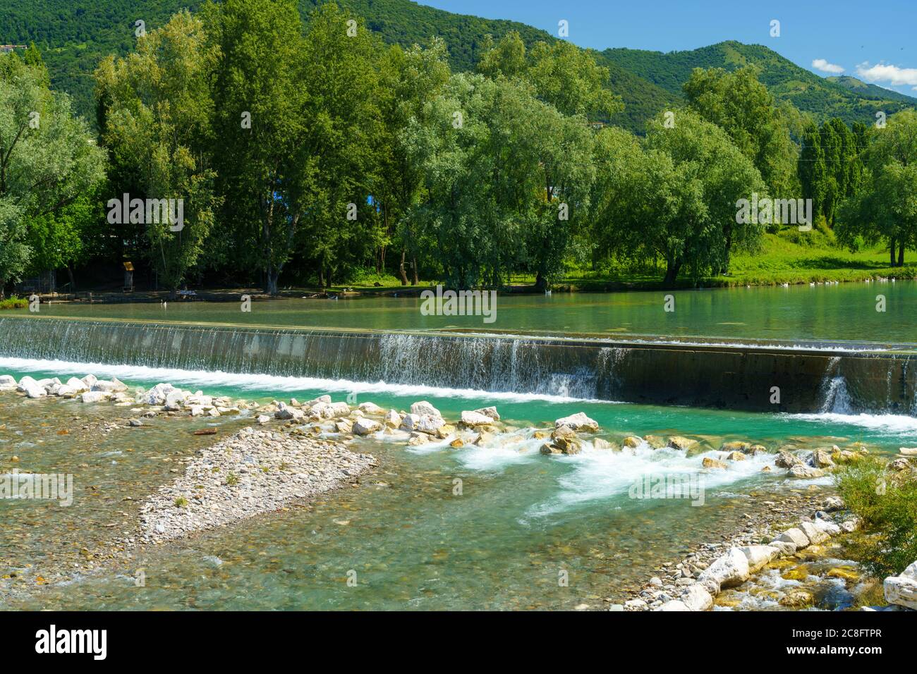 Serio river along the cycleway of Val Seriana, Lombardy, Italy, at ...